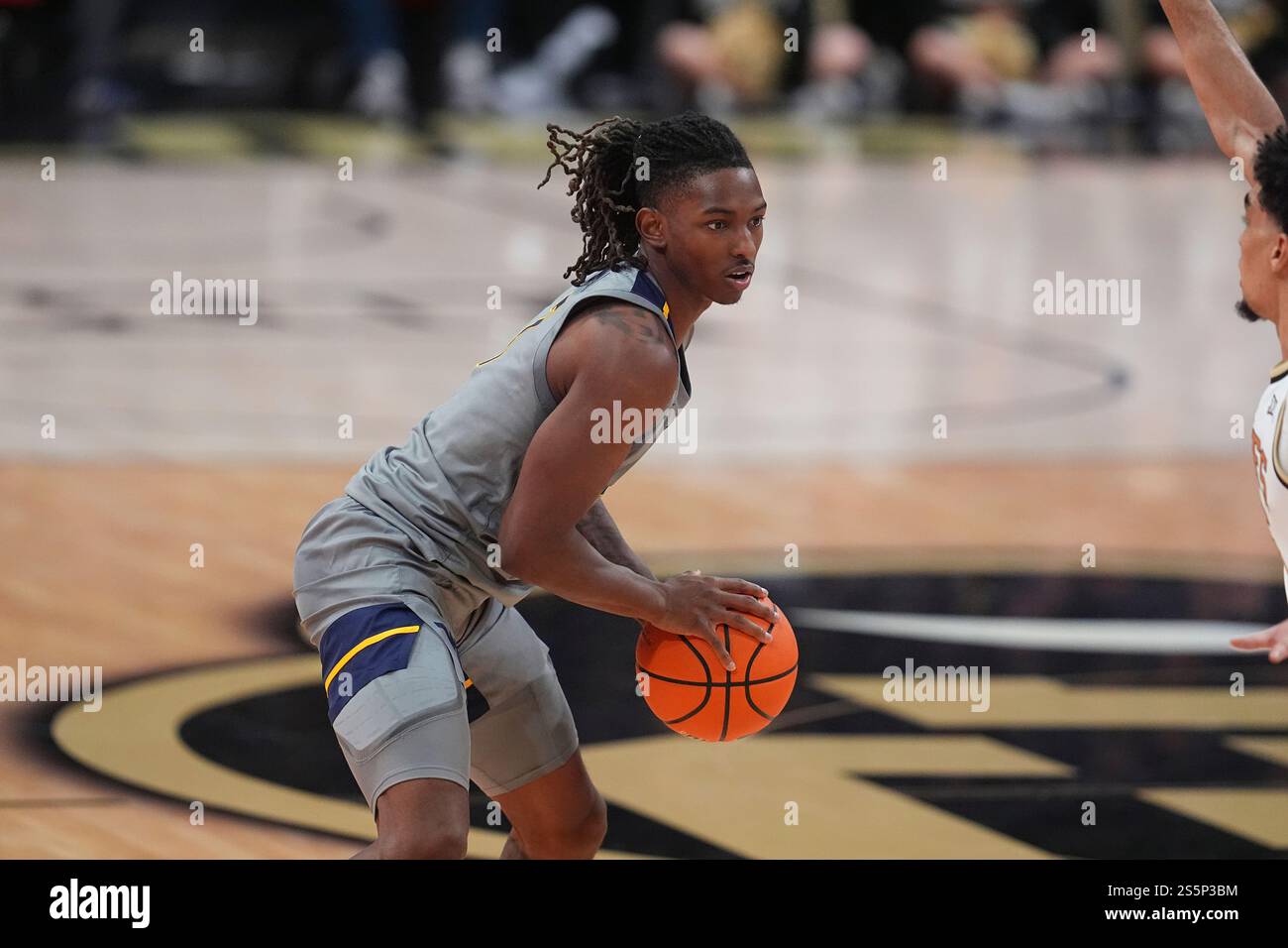 West Virginia guard Javon Small (7) in the first half of an NCAA ...