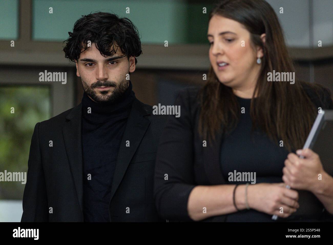 Melbourne, Australia. 15th Jan, 2025. Alexander Grutteria (left ...