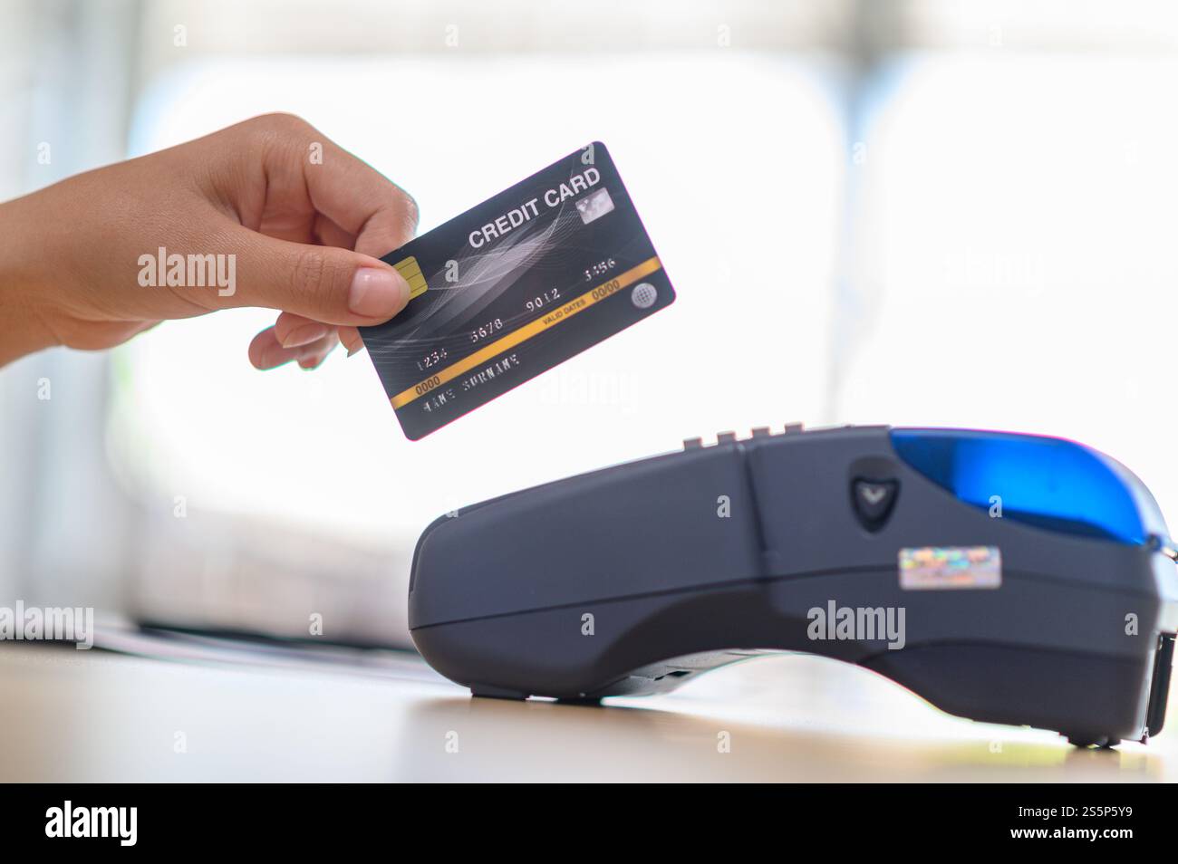 Credit cards and card swipes placed on the table Stock Photo - Alamy