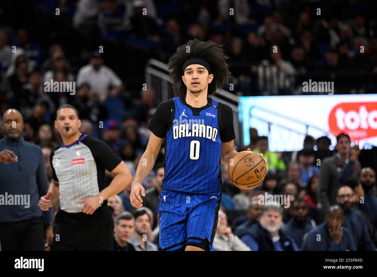 Orlando Magic guard Anthony Black (0) brings the ball up the court ...