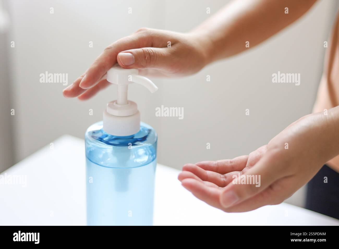 Hand applying Alcohol gel sanitazer liquid cleaning hands for prevent ...