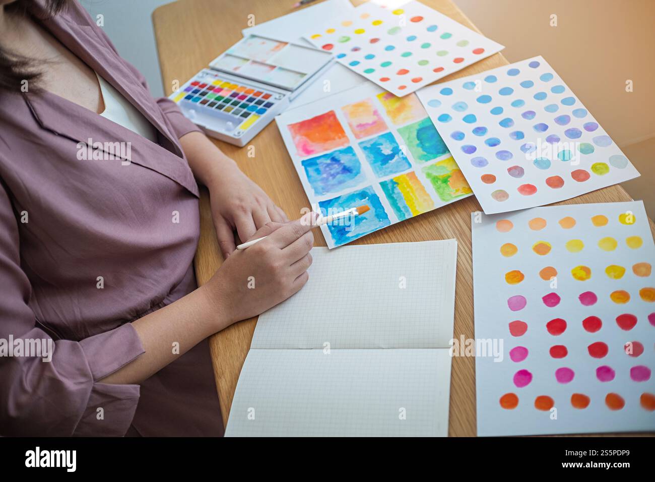 Artistic woman using tablet hi-res stock photography and images - Alamy