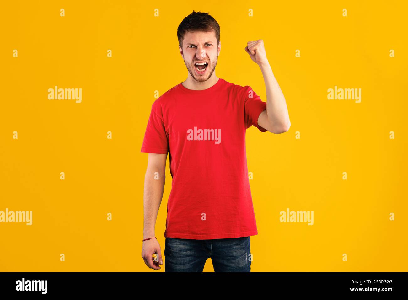 Angry man shaking clenched fist to camera Stock Photo - Alamy