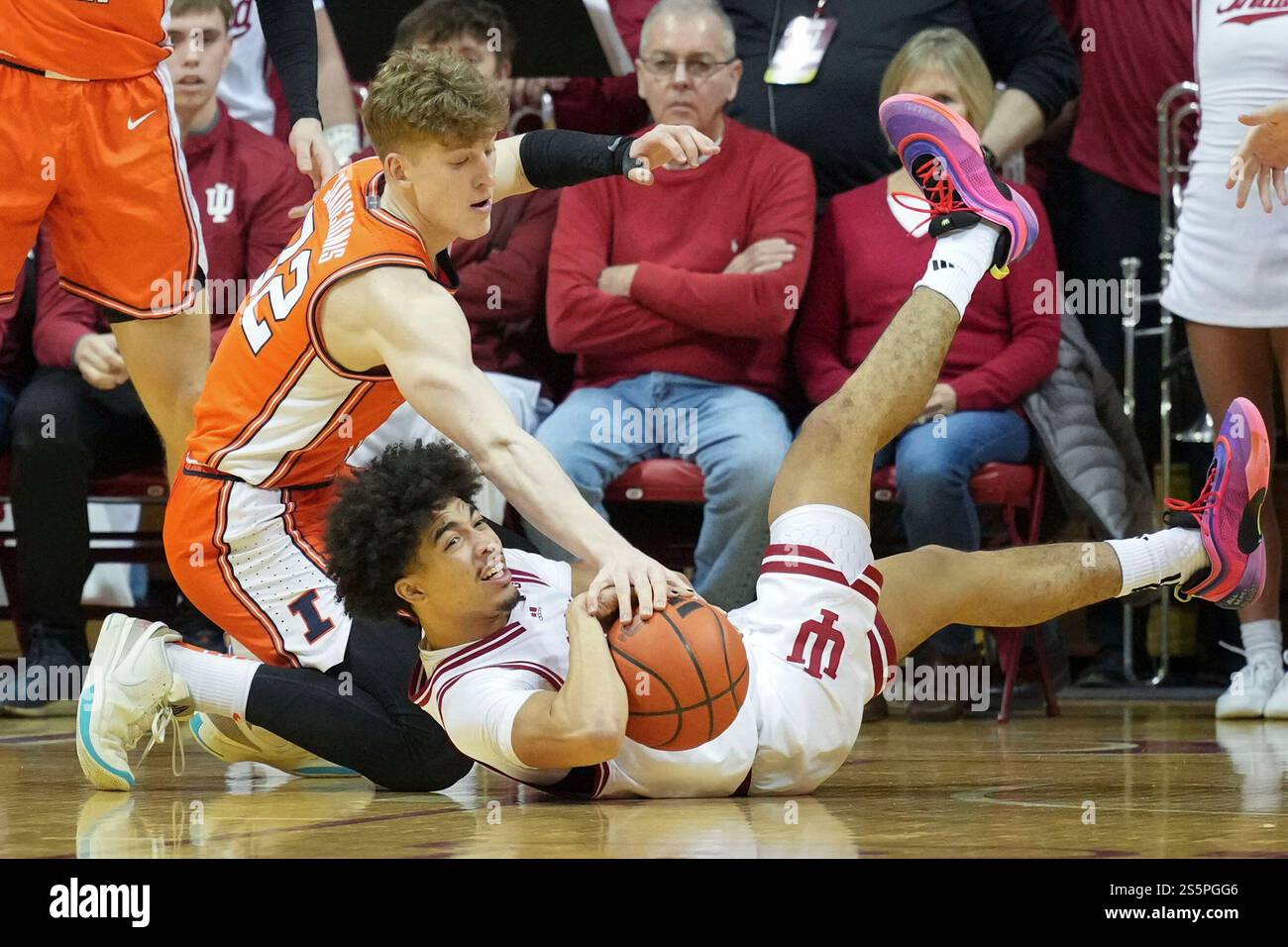 Indiana guard Myles Rice, right, fights for control of the ball with ...