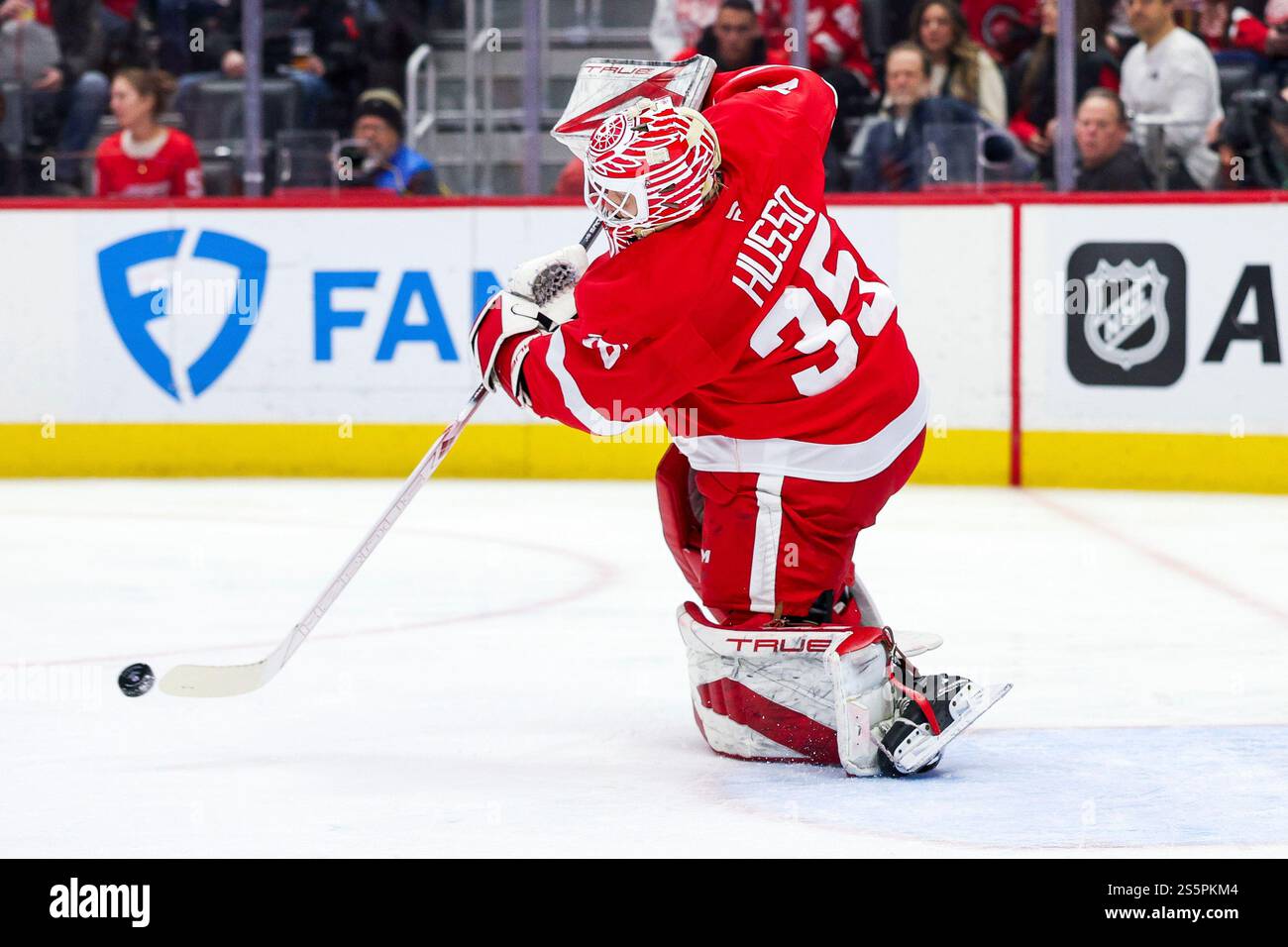 Detroit Red Wings goalie Ville Husso passes the puck away in the first ...