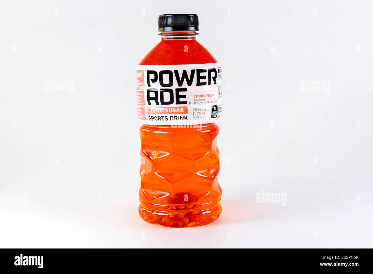 Refreshing sports drink in plastic bottle with orange liquid and clear ...