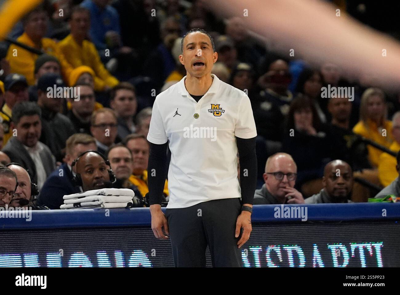 Marquette head coach Shaka Smart yells to his team during the first ...