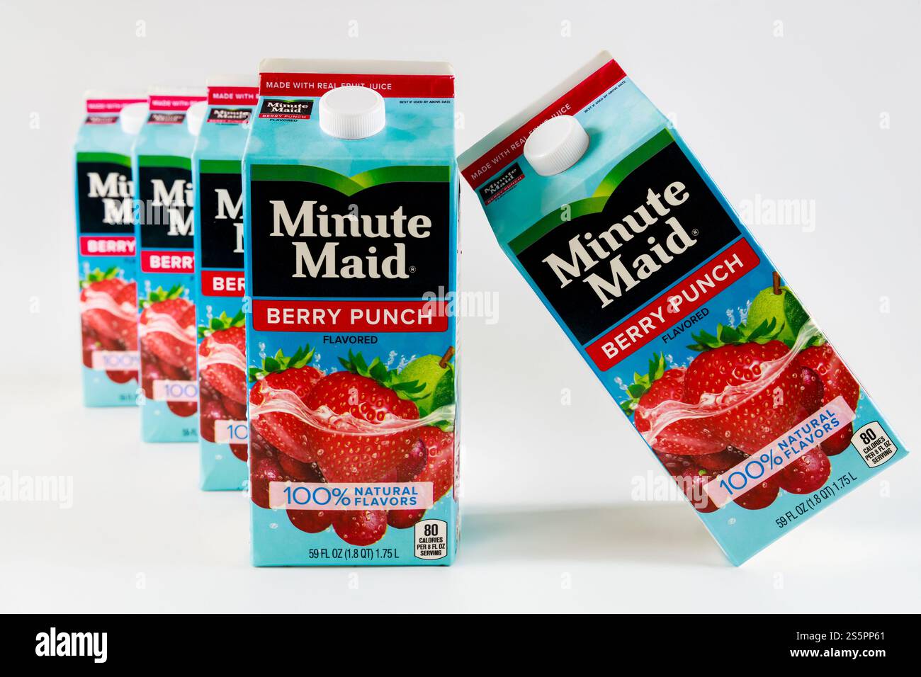 Berry punch drink cartons arranged attractively on clean, white surface ...