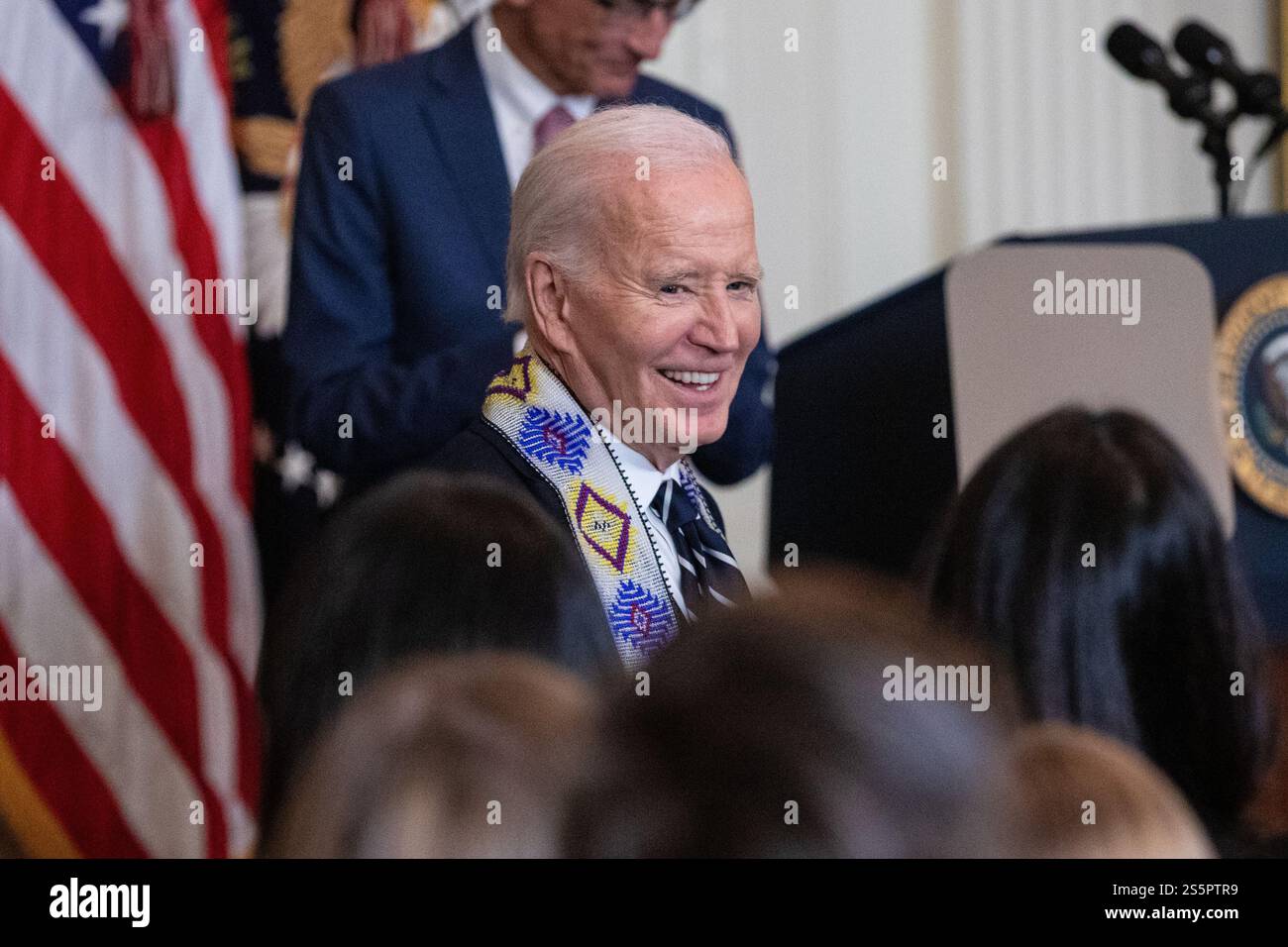 President Joe Biden is gifted an indigenous sash following the ...