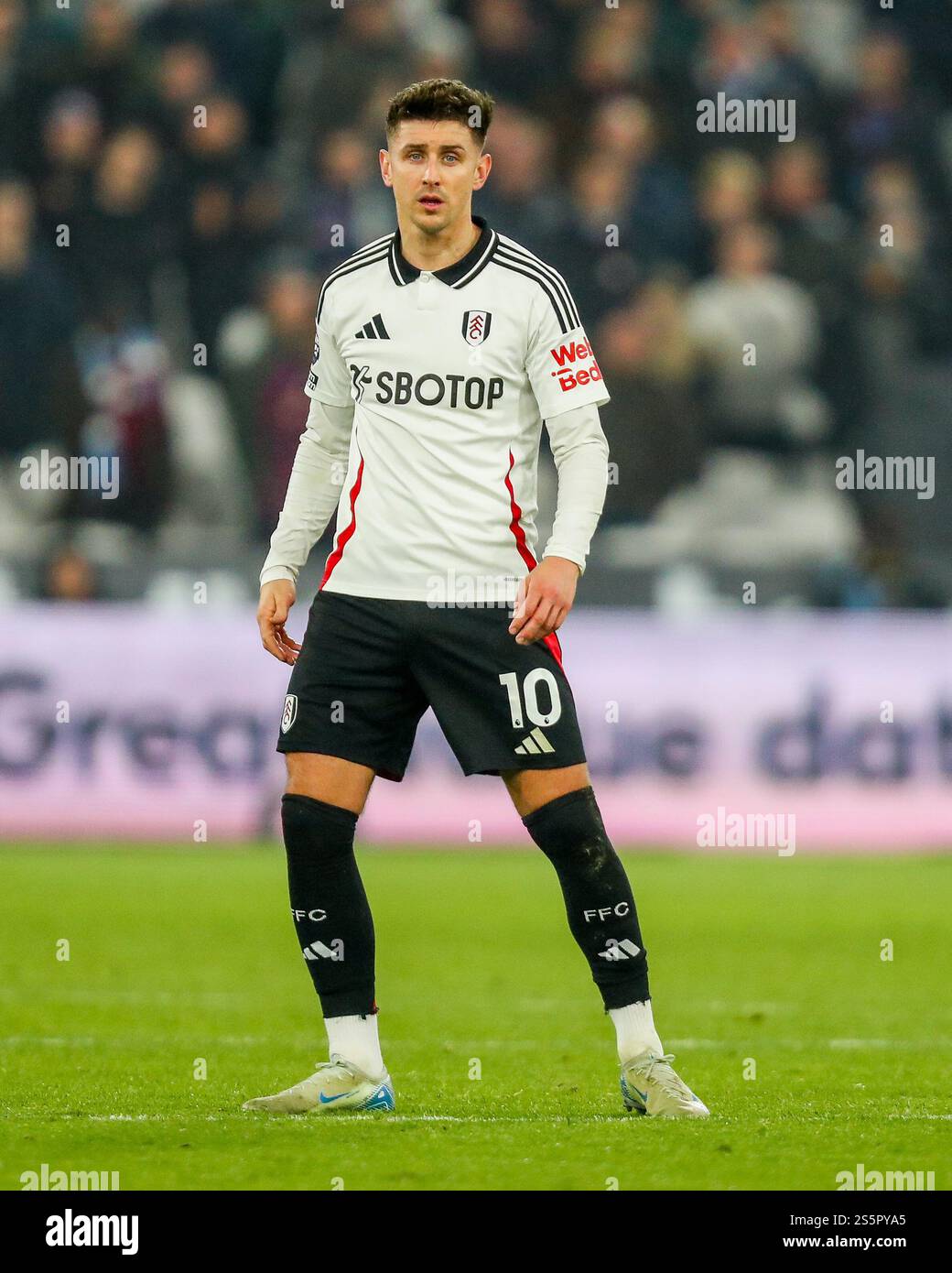 Tom Cairney of Fulham looks on during the Premier League match West Ham ...