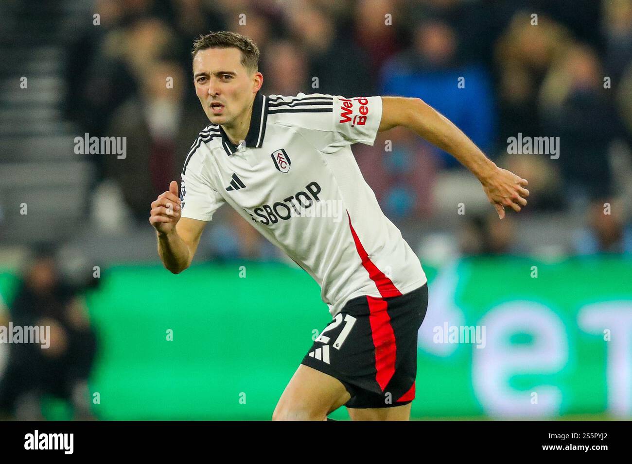 London, UK. 14th Jan, 2025. Timothy Castagne of Fulham in action during ...
