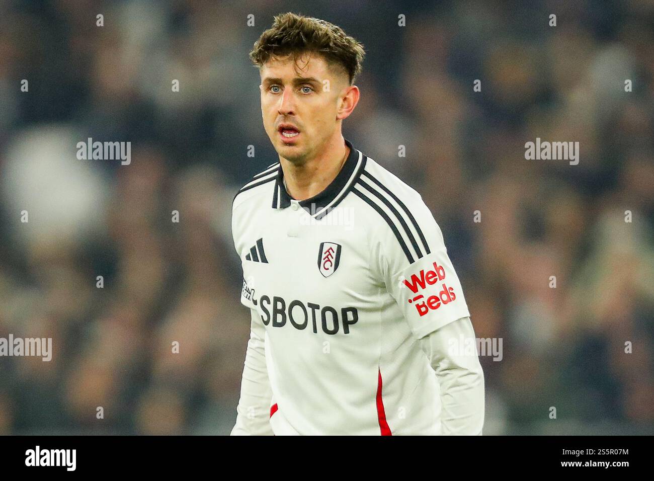Tom Cairney of Fulham looks on during the Premier League match West Ham ...