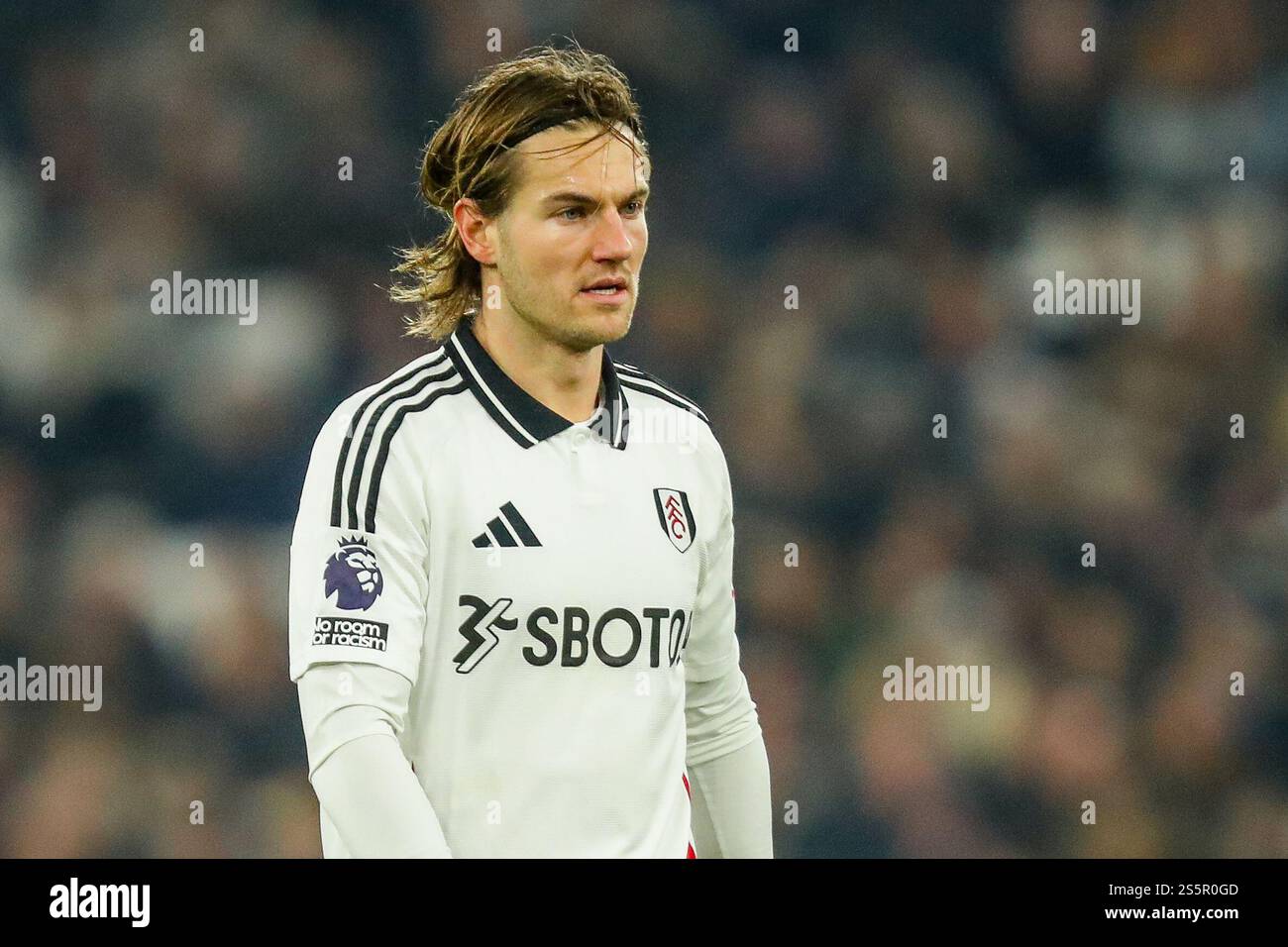 London, UK. 14th Jan, 2025. Joachim Andersen of Fulham looks on during ...
