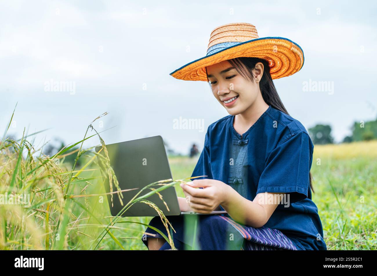 portrait of asian young farmer woman with Smart farming Agricultural ...