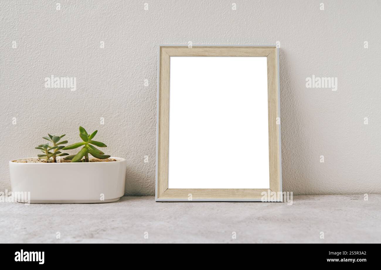 Standing picture frame with small potted plants Stock Photo - Alamy