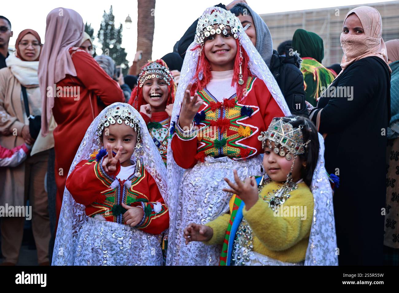 Rabat, Morocco. 14th Jan, 2025. Girls in national costumes attend the ...