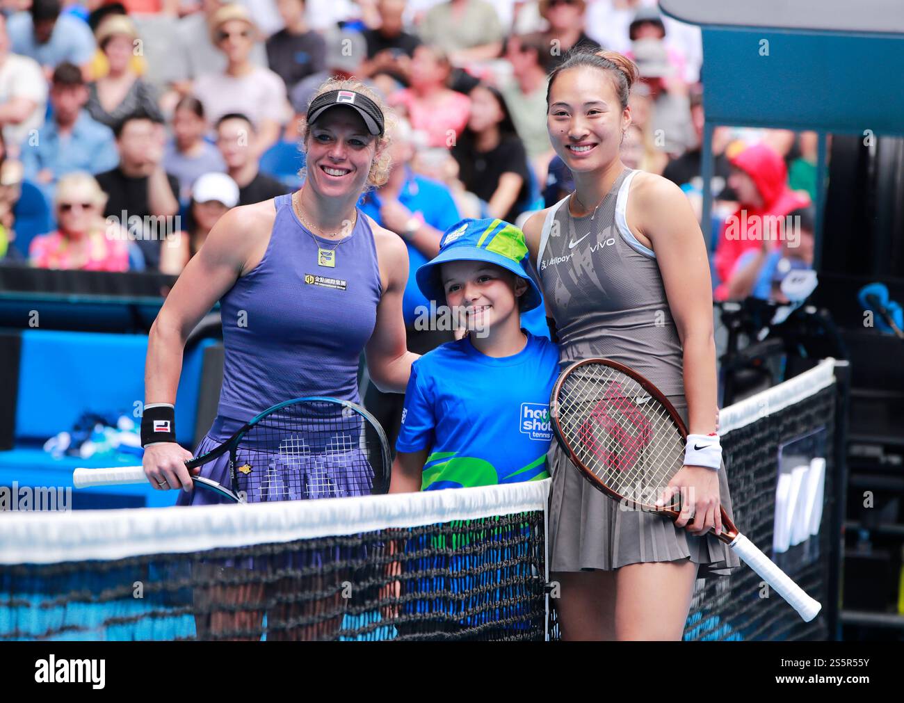 Melbourne, Australia. 15th Jan, 2025. Zheng Qinwen (R) and Laura ...