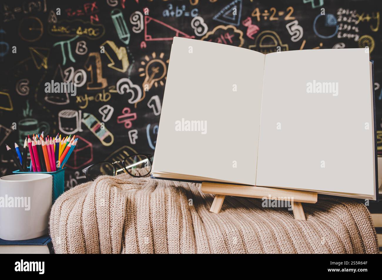 open book in the classroom Stock Photo - Alamy