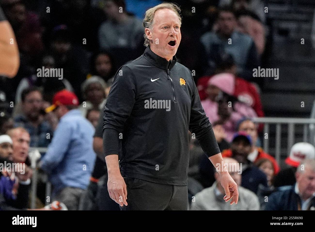 Phoenix Suns head coach Mike Budenholzer speaks during the first half ...