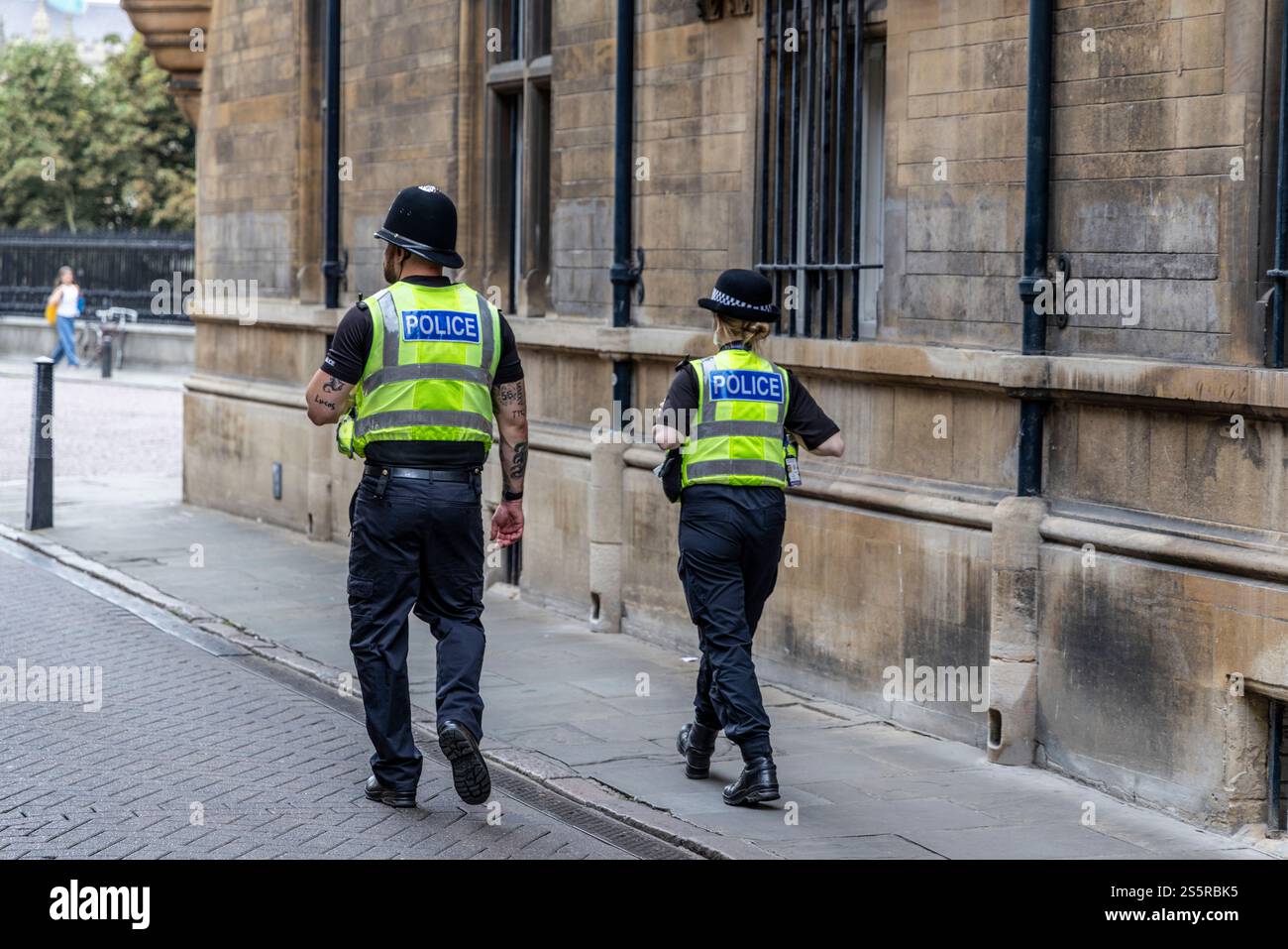 Cambridge England, male and female police officers walking the beat ...