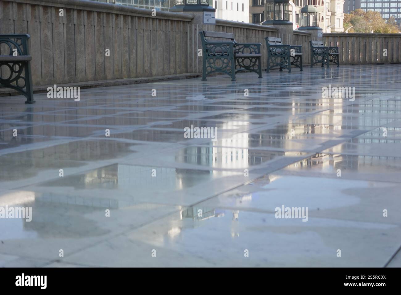 Wet Pavement with Beautiful Reflections in an Urban Setting and Scene ...