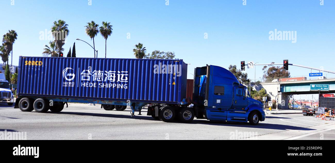 Freight Truck carrying an HEDE SHIPPING shipping container on a street ...