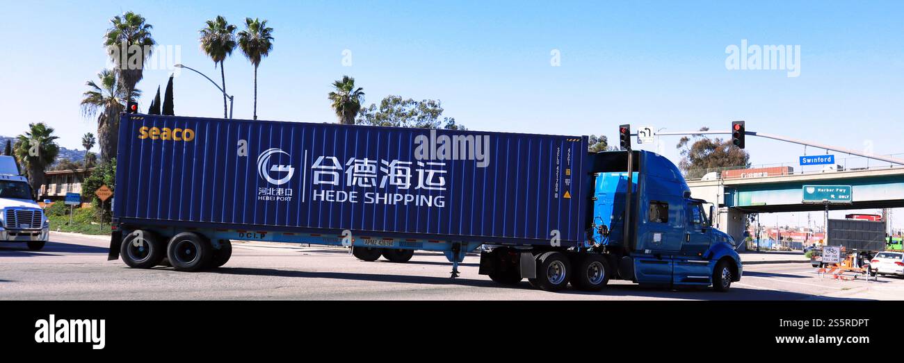 Freight Truck carrying an HEDE SHIPPING shipping container on a street ...