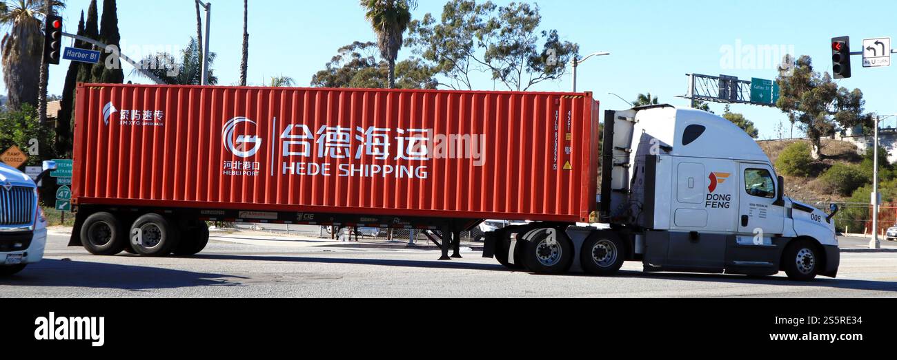 Freight Truck carrying an HEDE SHIPPING shipping container on a street ...