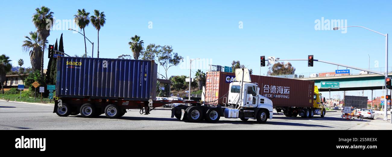 Freight Truck carrying a SEACO shipping container on a street toward ...