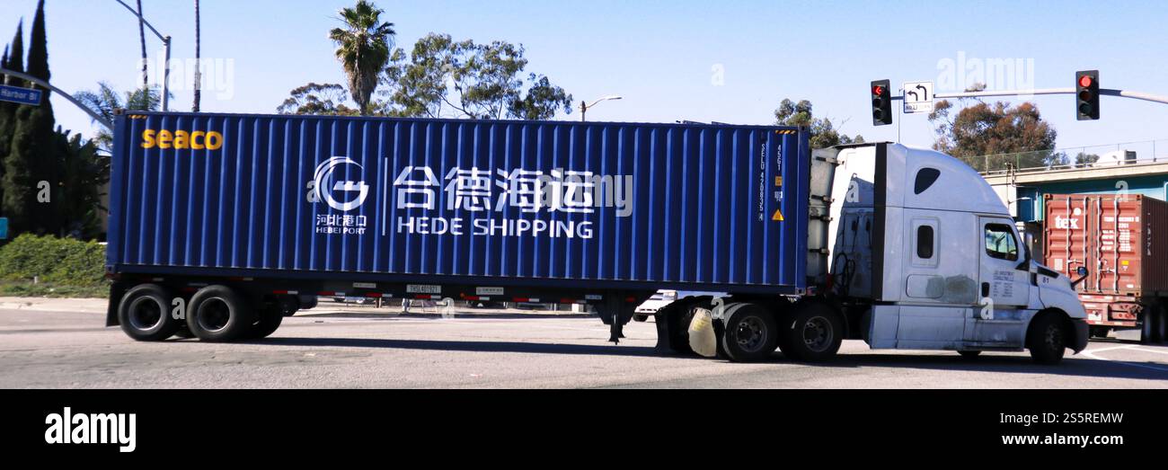 Freight Truck carrying an HEDE SHIPPING shipping container on a street ...