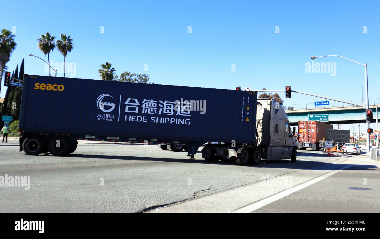 Freight Truck carrying an HEDE SHIPPING shipping container on a street ...