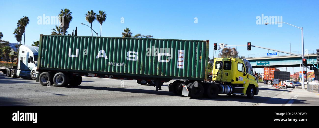 Freight Truck carrying an UASC shipping container on a street toward ...