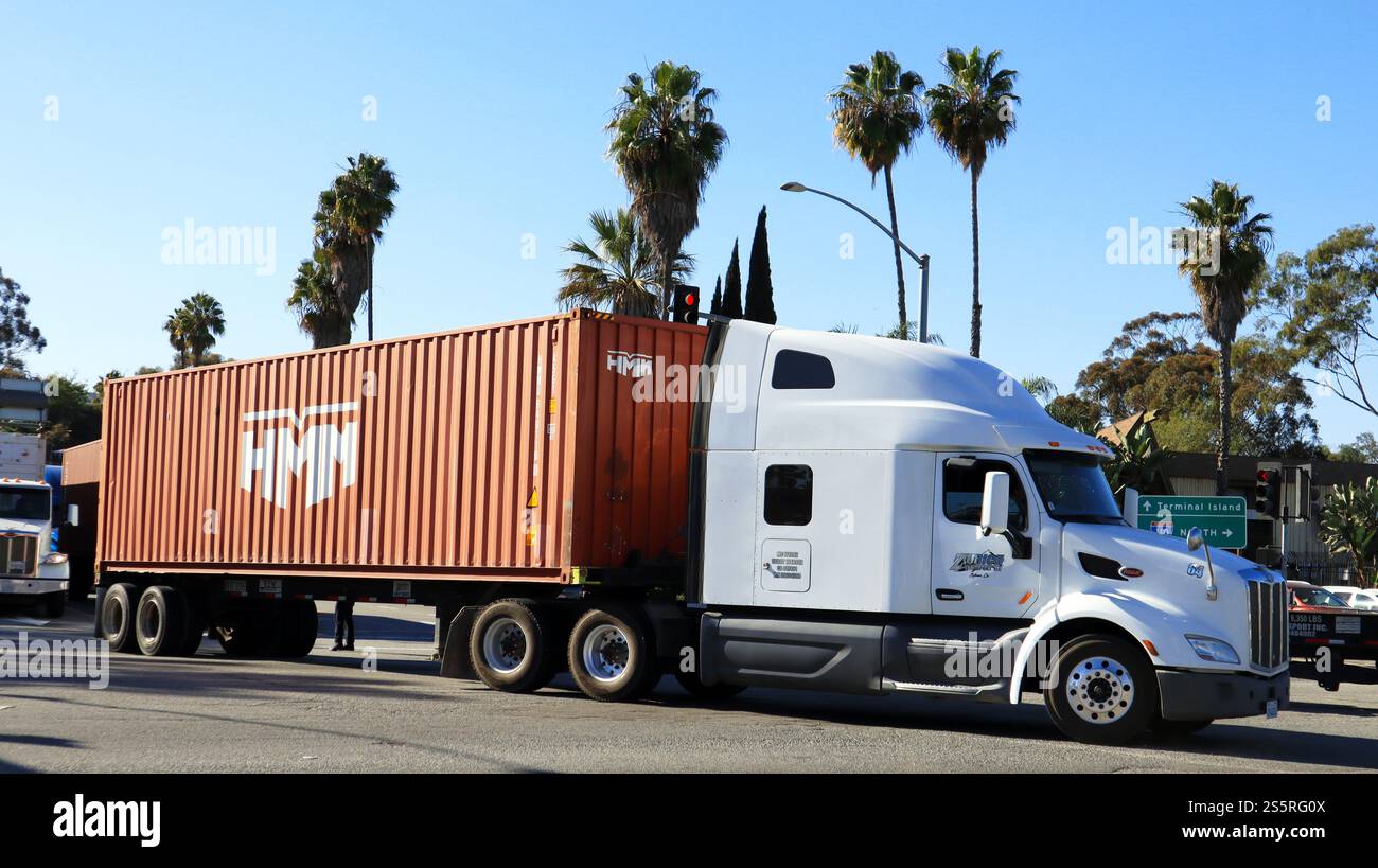 Freight Truck carrying a HMM shipping container on a street toward the Port of Los Angeles in ...