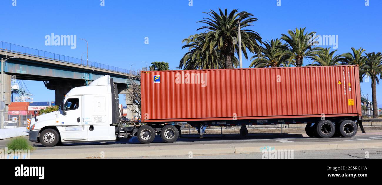 Freight Truck carrying a FLORENS shipping container on a street toward ...