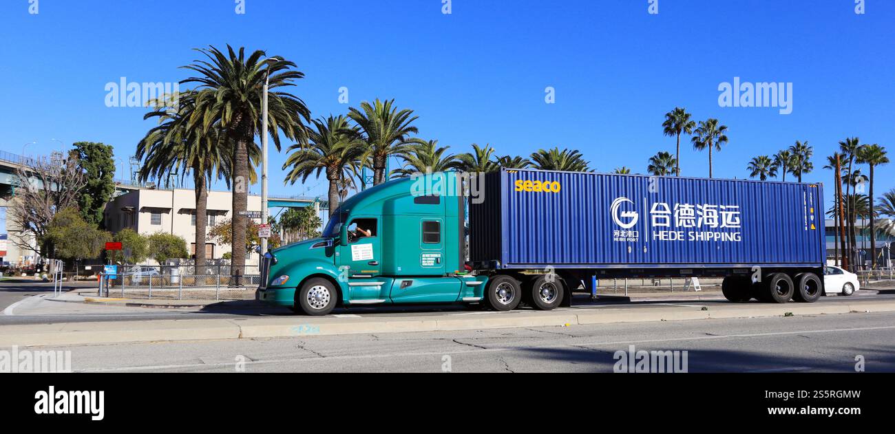 Freight Truck carrying an HEDE SHIPPING shipping container on a street ...