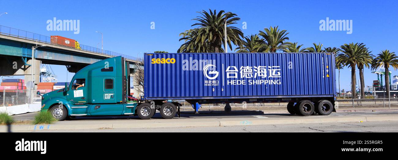 Freight Truck carrying an HEDE SHIPPING shipping container on a street ...