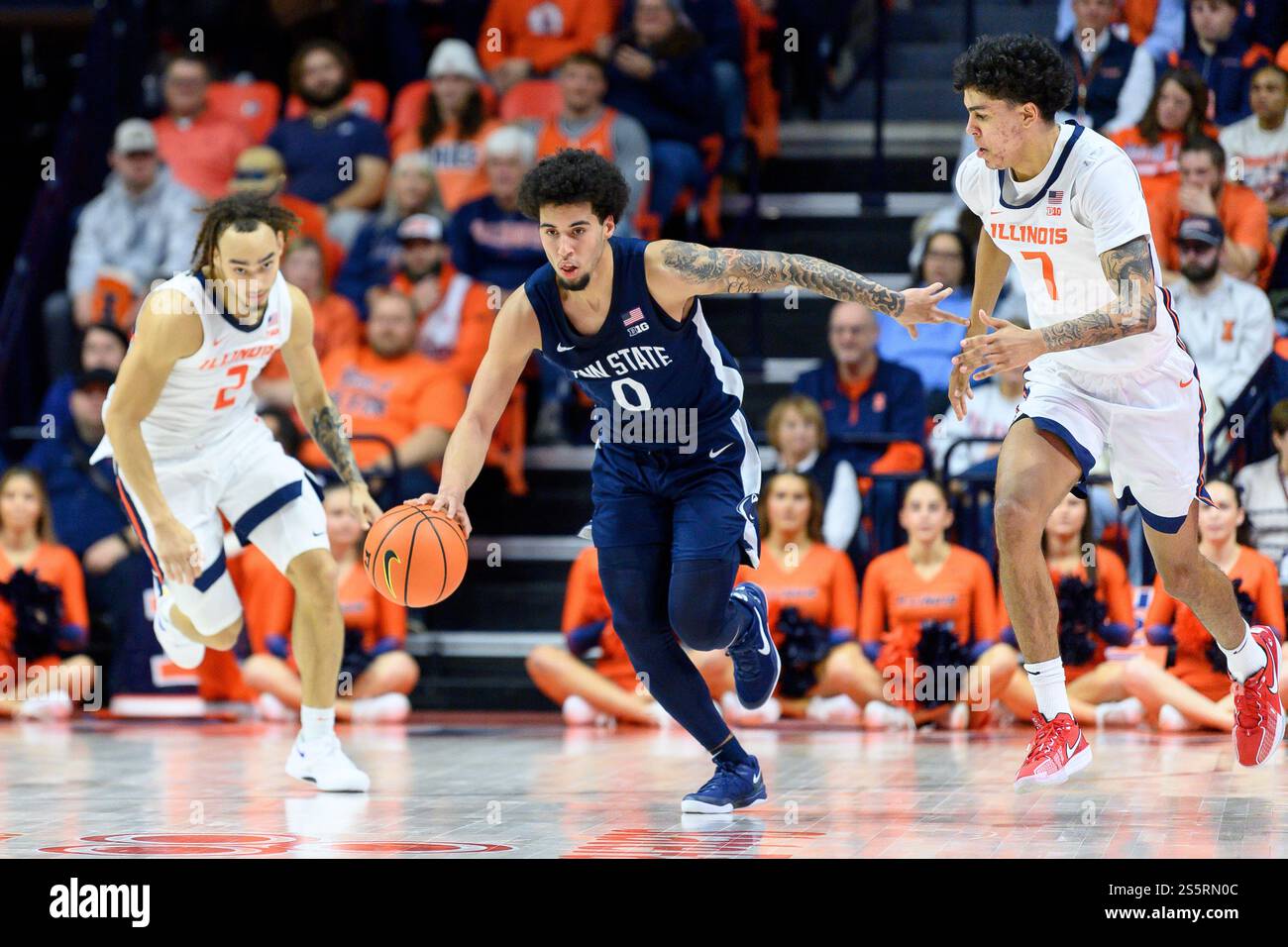 Penn State's Jahvin Carter brings the ball up the floor ahead of ...