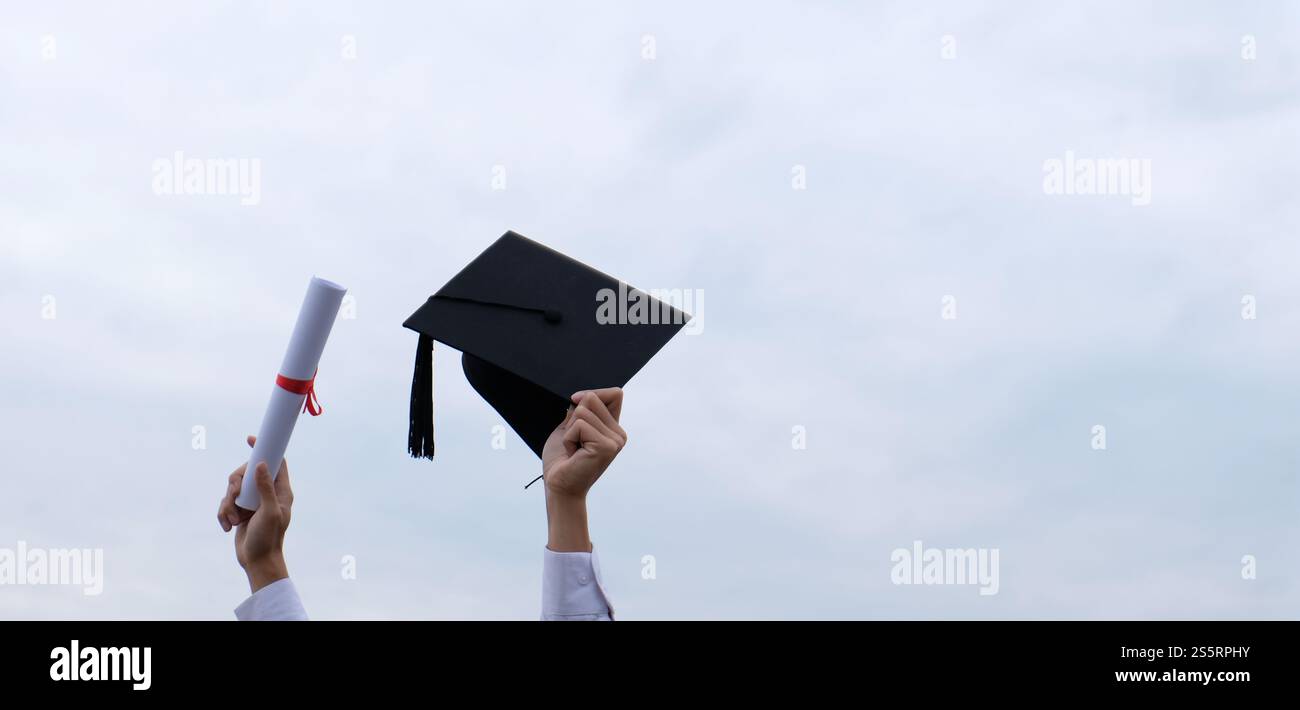 Student with congratulations, graduates wearing a graduation gown of ...