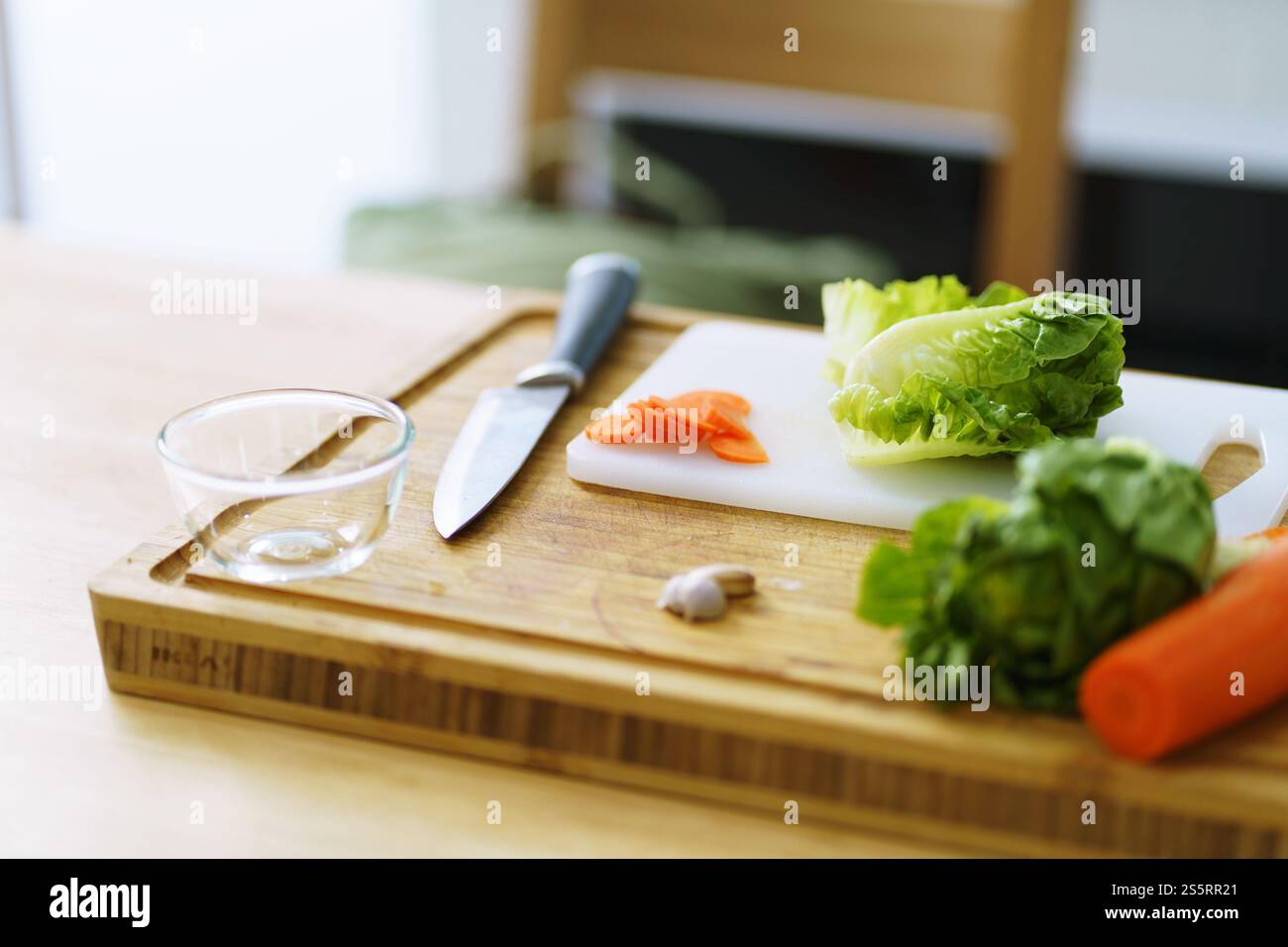 Prepare food woman is preparing vegetable salad in the kitchen Healthy Food Healthy Cooking ...