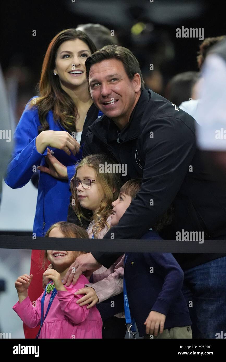 Gov. Ron DeSantis and his family watch players warm up before a match ...
