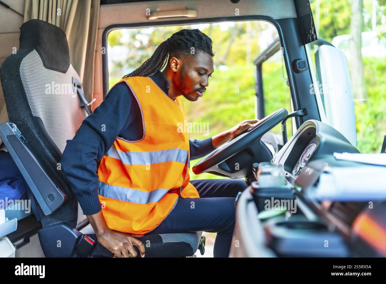 View from inside the vehicle of an african driver about to drive a ...
