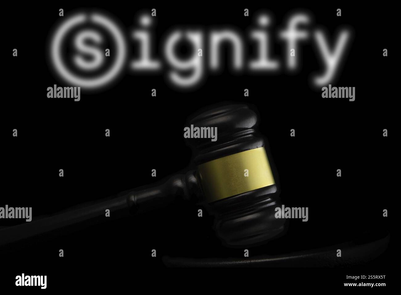 Court gavel in front of the Signify logo. Signify N.V. is a Dutch ...
