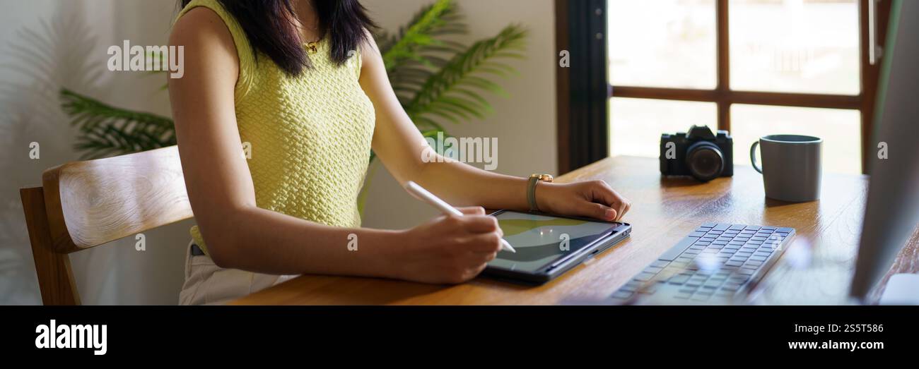Graphic designer working on digital tablet. artist drawing on graphic tablet and Color swatch ...