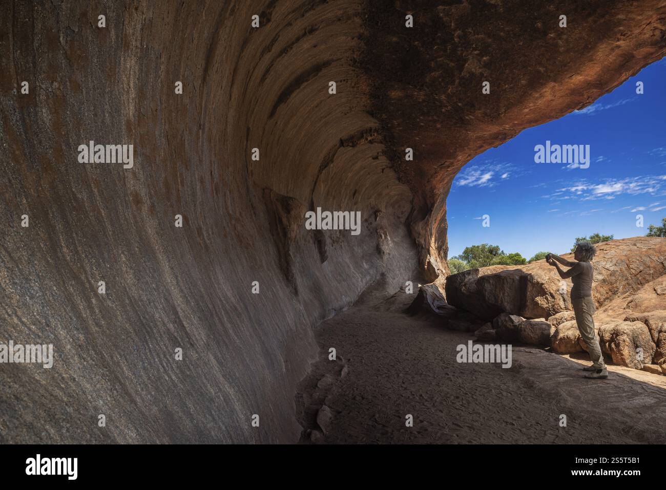 Uluru, formerly Ayers Rock, cave at Mala Walk, Uluru-Kata Tjuta ...