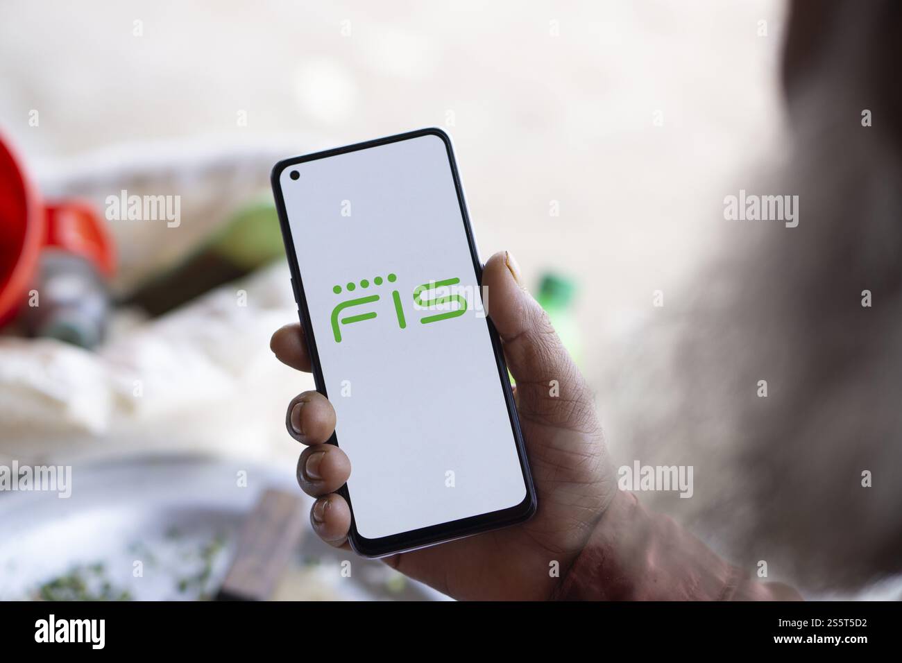 fis logo is displayed on smartphone. Fidelity National Information ...