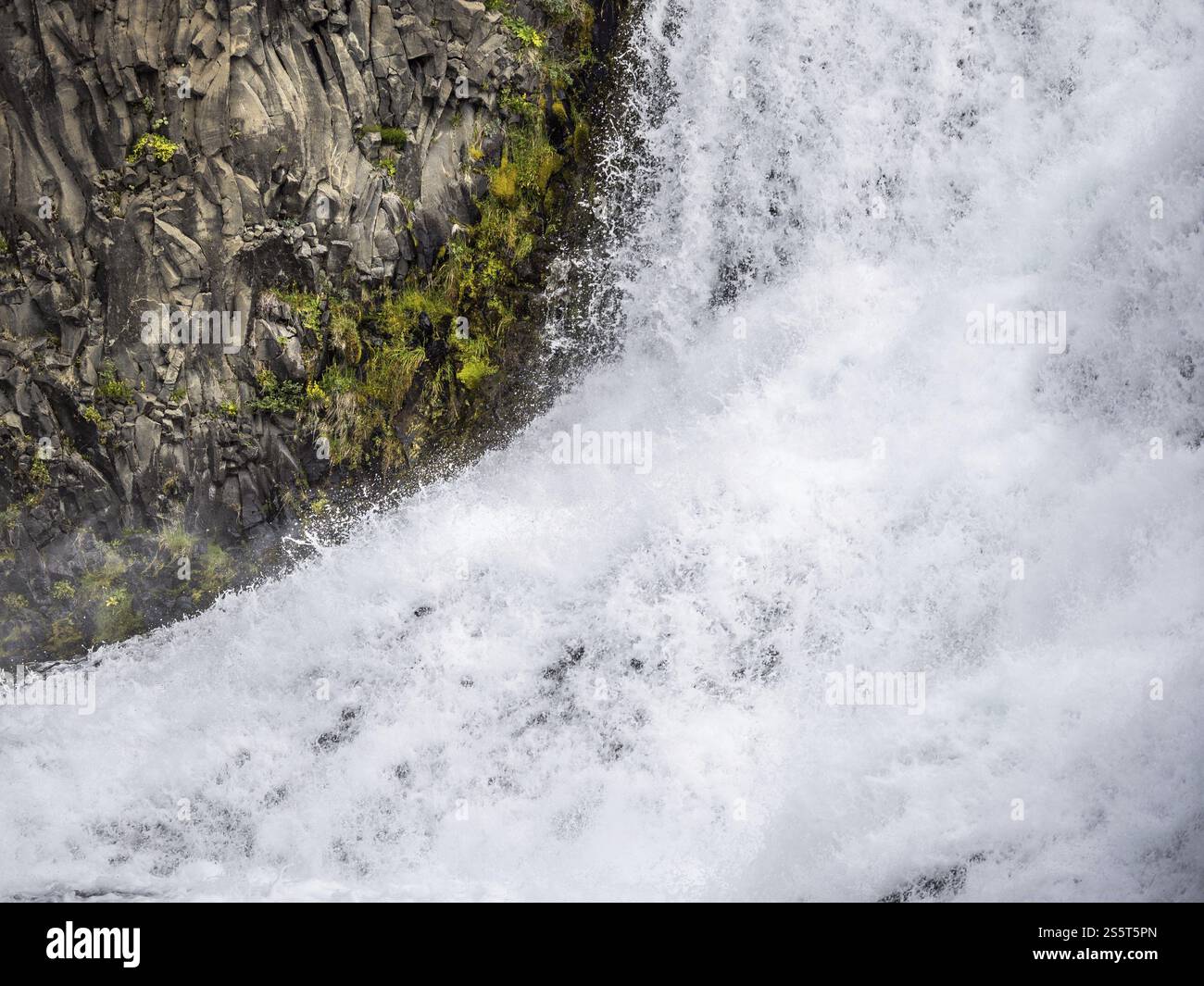 Water masses from a waterfall, Hjalparfoss, river Fossa i Pjorsardal ...