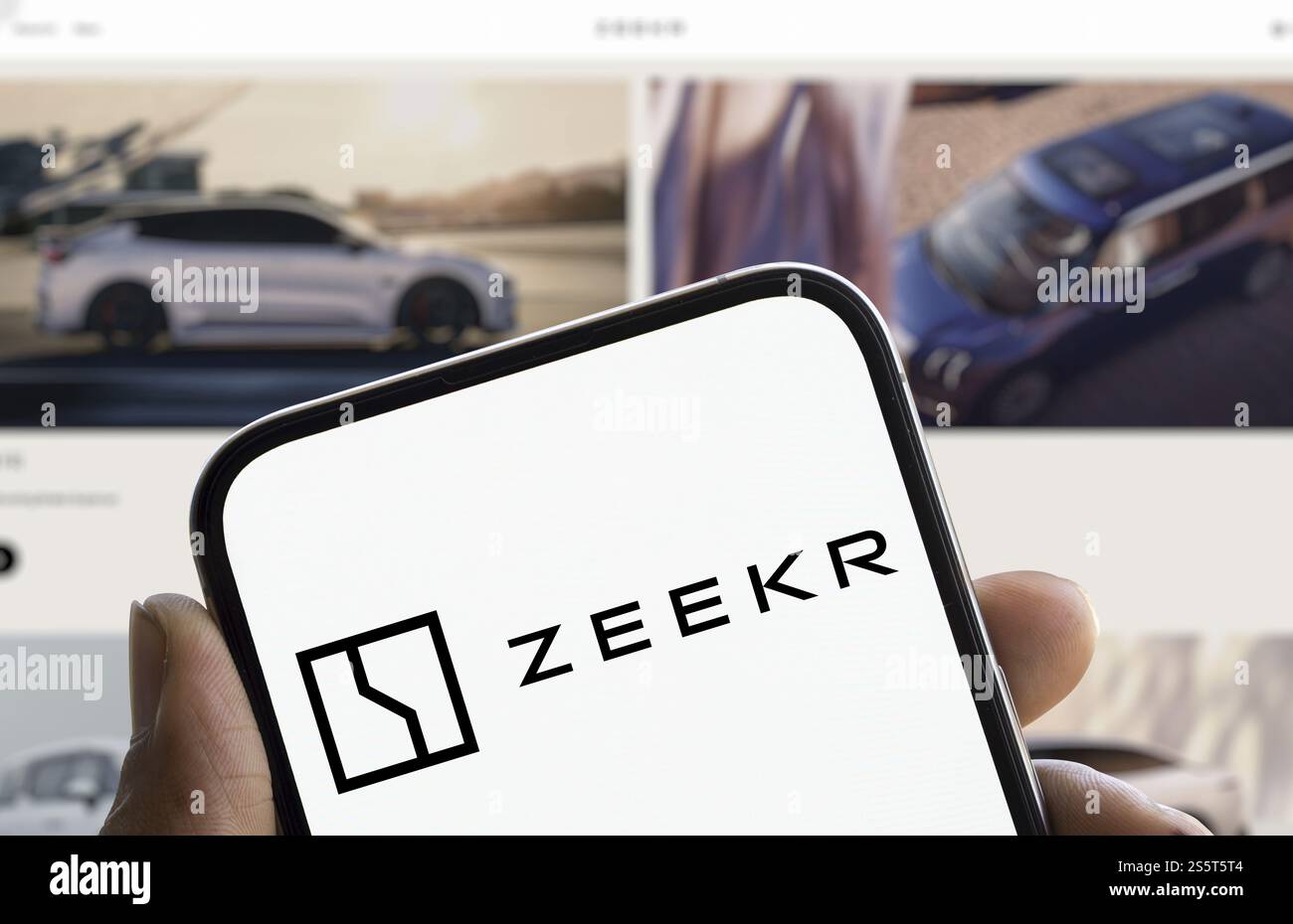Zeekr logo is displayed on smartphone. Zeekr Technology Group is a ...