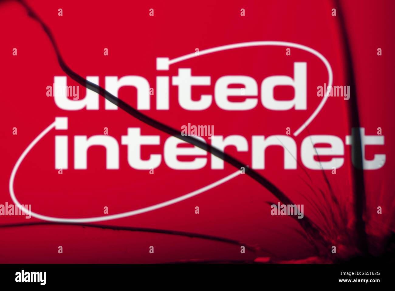 united internet logo is visible on the broken glass. United Internet AG ...