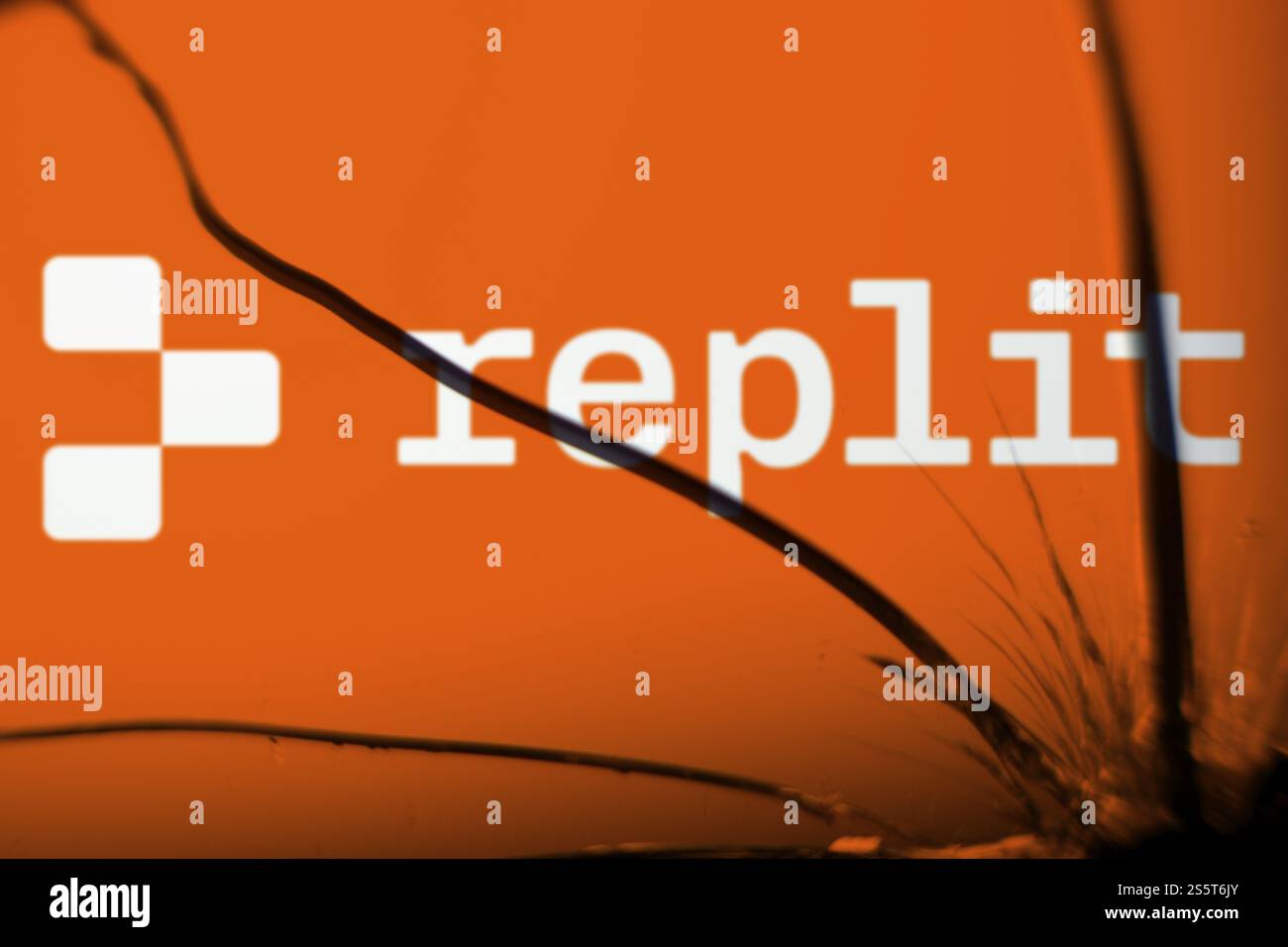 replit logo is visible on the broken glass. Replit is an American start-up and an online ...