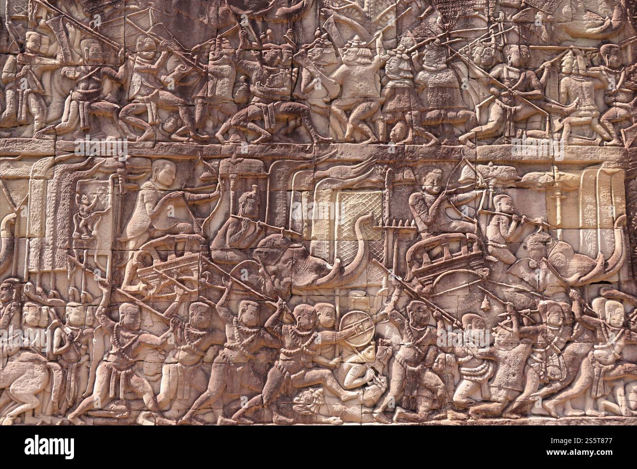 Mural bass-relief art in ancient temple Bayon Angkor complex, Cambodia ...